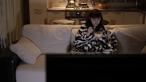 woman in the evening at home alone sitti... | Stock Video | Pond5