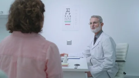 Woman in eyeglasses reading letters on e... | Stock Video | Pond5