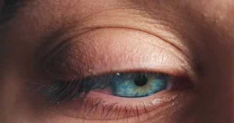 Woman face, blue color eyes and focus, v... | Stock Video | Pond5