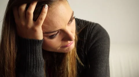 Woman face sad and stressed closeup 4K | Stock Video | Pond5