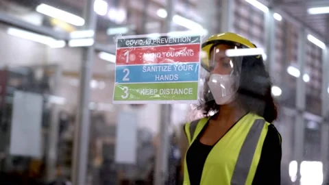 woman factory worker holding the signage... | Stock Video | Pond5