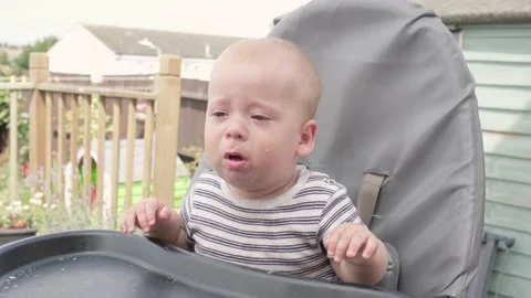 Woman feeding Tired child with spoon. Mo... | Stock Video | Pond5