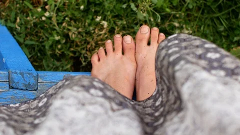 Woman feet barefoot on spring soil, long... | Stock Video | Pond5