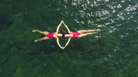 Woman floating sea. Aerial top view of t... | Stock Video | Pond5