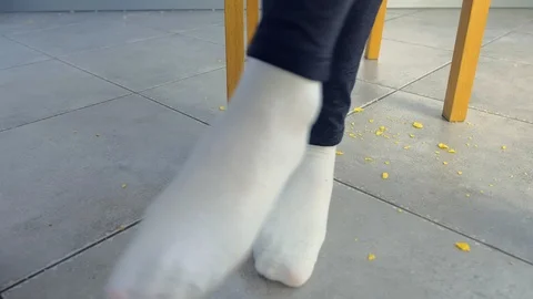 Woman gets up from the table and steps o... | Stock Video | Pond5