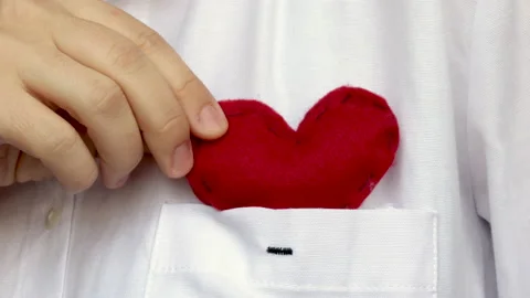 woman girl female putting red soft heart... | Stock Video | Pond5