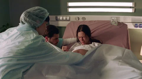 Woman giving birth at the hospital | Stock Video | Pond5