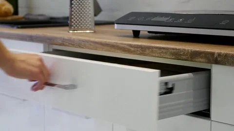 Woman Hand Opening Drawers Of A White Ki... | Stock Video | Pond5