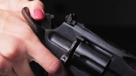 Woman Revolver Stock Footage ~ Royalty Free Stock Videos | Pond5