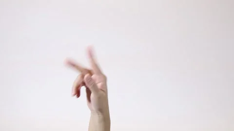 Woman hand showing victory sign, v sign ... | Stock Video | Pond5