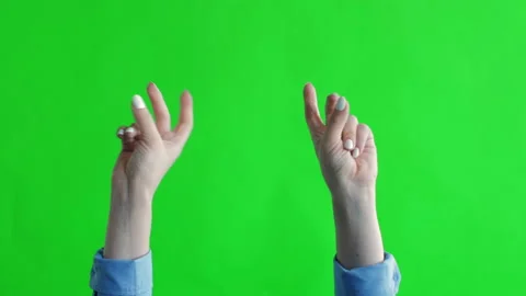 Woman hand snaps her fingers over green ... | Stock Video | Pond5