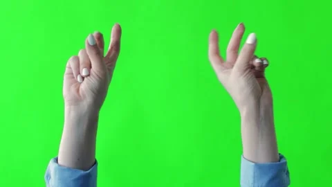 Woman hand snaps her fingers over green ... | Stock Video | Pond5