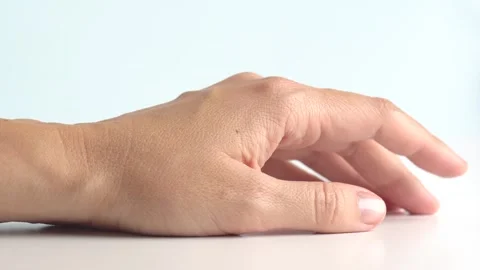 Woman hand tapping her fingers on the wh... | Stock Video | Pond5