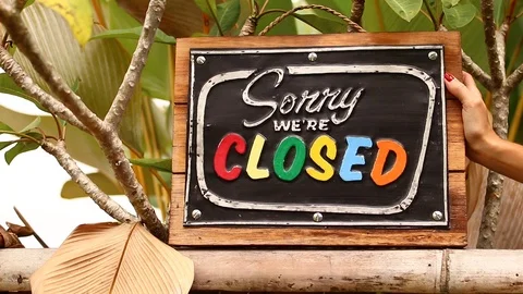 Woman hands with closed sign board on a ... | Stock Video | Pond5