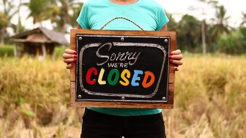 Woman hands with closed sign board on a ... | Stock Video | Pond5