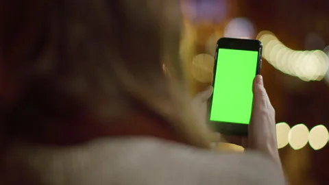 Woman hands touching green screen phone.... | Stock Video | Pond5