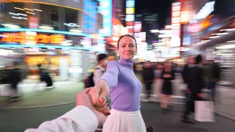 Woman hold hand and spin around, first p... | Stock Video | Pond5