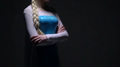 A woman in the image of Elsa from the ca... | Stock Video | Pond5
