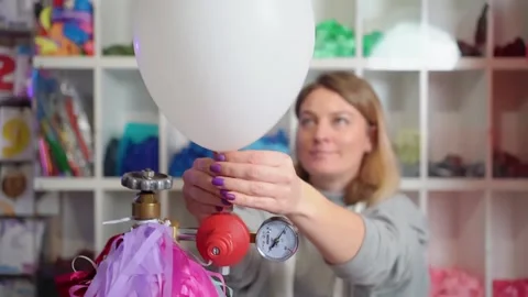 Balloon Inflate Helium Stock Footage ~ Royalty Free Stock Videos | Pond5