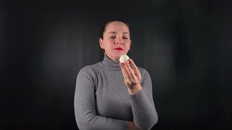 A woman interacting with an object isola... | Stock Video | Pond5
