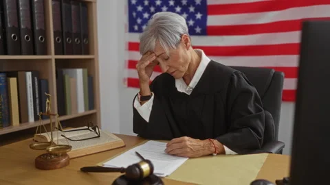 Woman judge looking stressed in office w... | Stock Video | Pond5