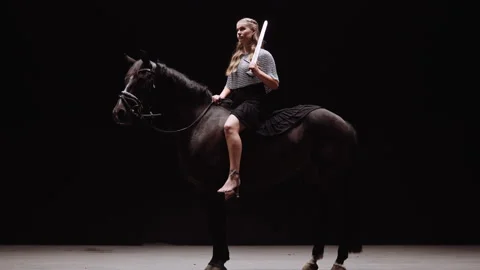 Woman Knight Riding Horse In Studio | Stock Video | Pond5