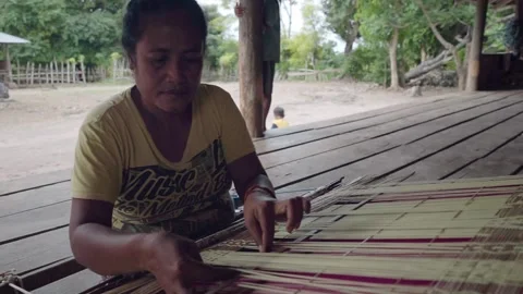 Woman is knitting traditional cloth | In... | Stock Video | Pond5