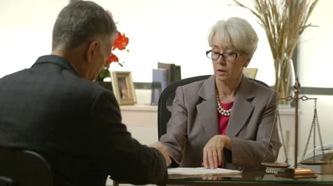 woman lawyer talking to her client and s... | Stock Video | Pond5