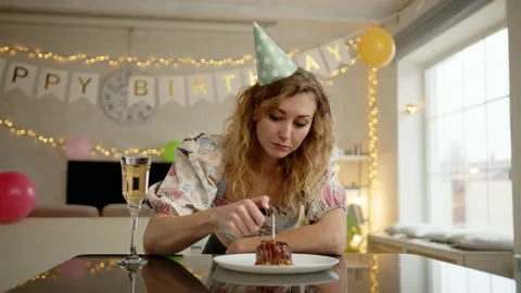 A woman looking around the room before p... | Stock Video | Pond5