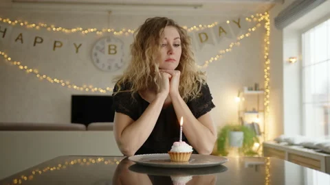 A woman looking around the room before p... | Stock Video | Pond5