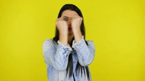 Woman makes a gesture with two hands and... | Stock Video | Pond5