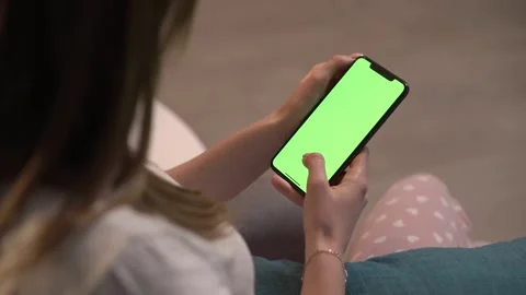 Woman makes swipe gestures on smartphone... | Stock Video | Pond5
