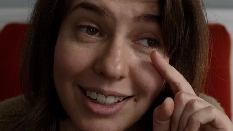 Woman making face showing a fake tear ro... | Stock Video | Pond5