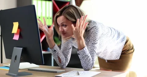 Woman manager looking at computer screen... | Stock Video | Pond5