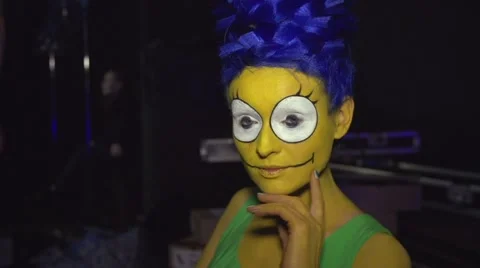 Woman in Marge Simpson make up | Stock Video | Pond5