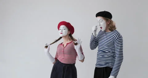 Woman mime denying kiss to male mime art... | Stock Video | Pond5