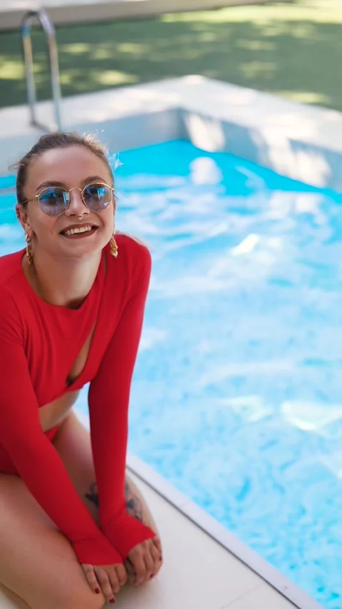 Woman model in red bikini and sunglasses... | Stock Video | Pond5