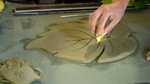 Woman modeling green clay manufacturing ... | Stock Video | Pond5