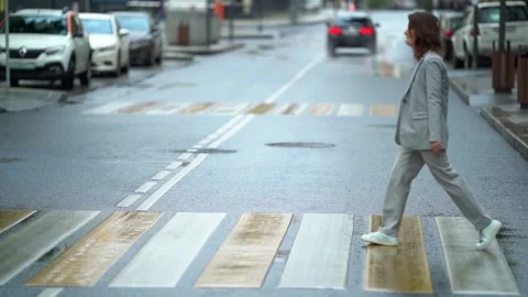woman with neck brace is walking on pede... | Stock Video | Pond5
