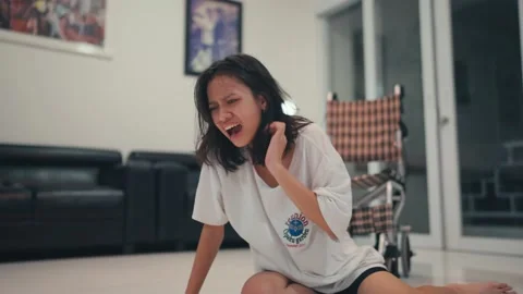 A woman is paralyzed crying in pain and ... | Stock Video | Pond5