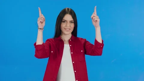 Woman pointing at the top of the screen ... | Stock Video | Pond5