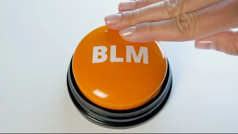 Woman pressing BLM button. Black Lives M... | Stock Video | Pond5