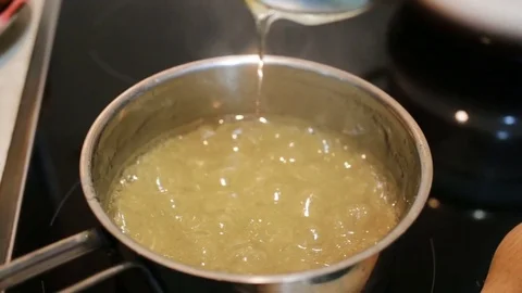 Woman prevents hot agar-agar. The syrup ... | Stock Video | Pond5