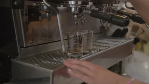 A Woman Pulling Shots on an Espresso Mac... | Stock Video | Pond5