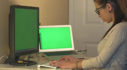 Woman Reading dual computer monitors -gr... | Stock Video | Pond5