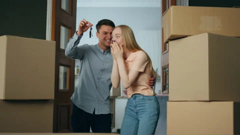 Woman rejoicing moving new home hugging ... | Stock Video | Pond5
