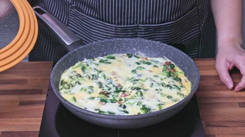 Woman Frying Eggs Stock Videos – Royalty-Free HD & 4K Videos