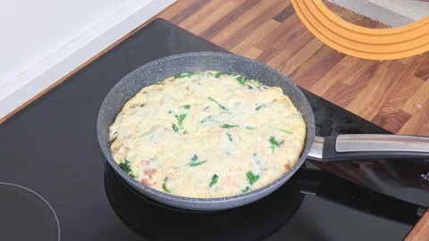 Woman Frying Eggs Stock Videos – Royalty-Free HD & 4K Videos