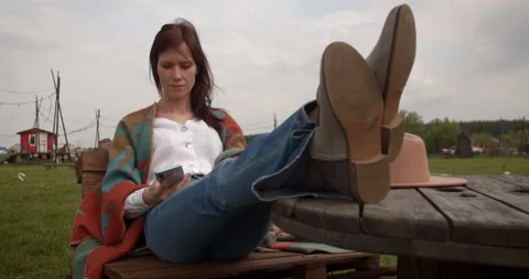 Woman rest in camping sit on bench with ... | Stock Video | Pond5