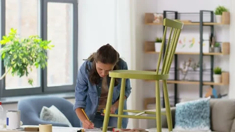 woman with ruler measuring chair for ren... | Stock Video | Pond5